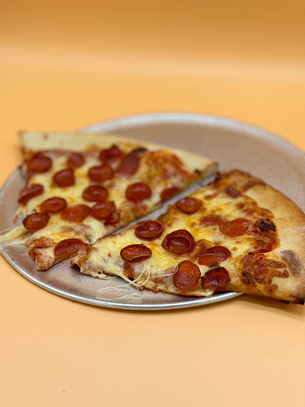 Angeli's Pizzeria - pizza slice in baltimore